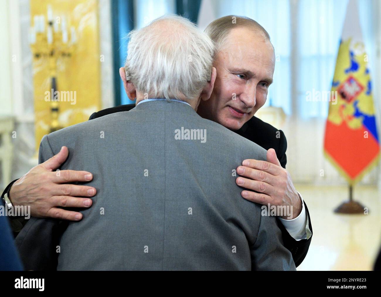 Russian President Vladimir Putin greets famous Russian writer Daniil ...