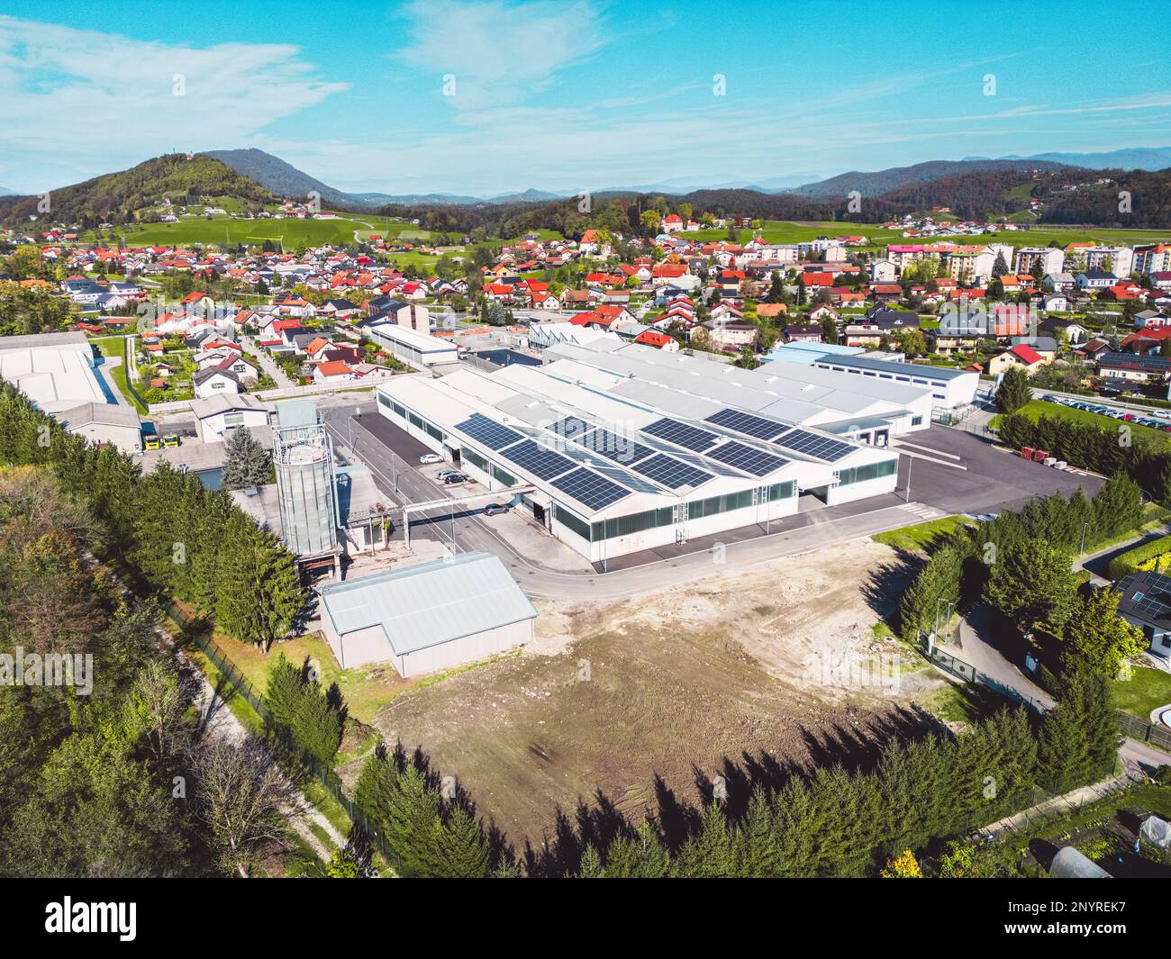 Aerial view of a factory with roof top covered in solar panels Stock ...