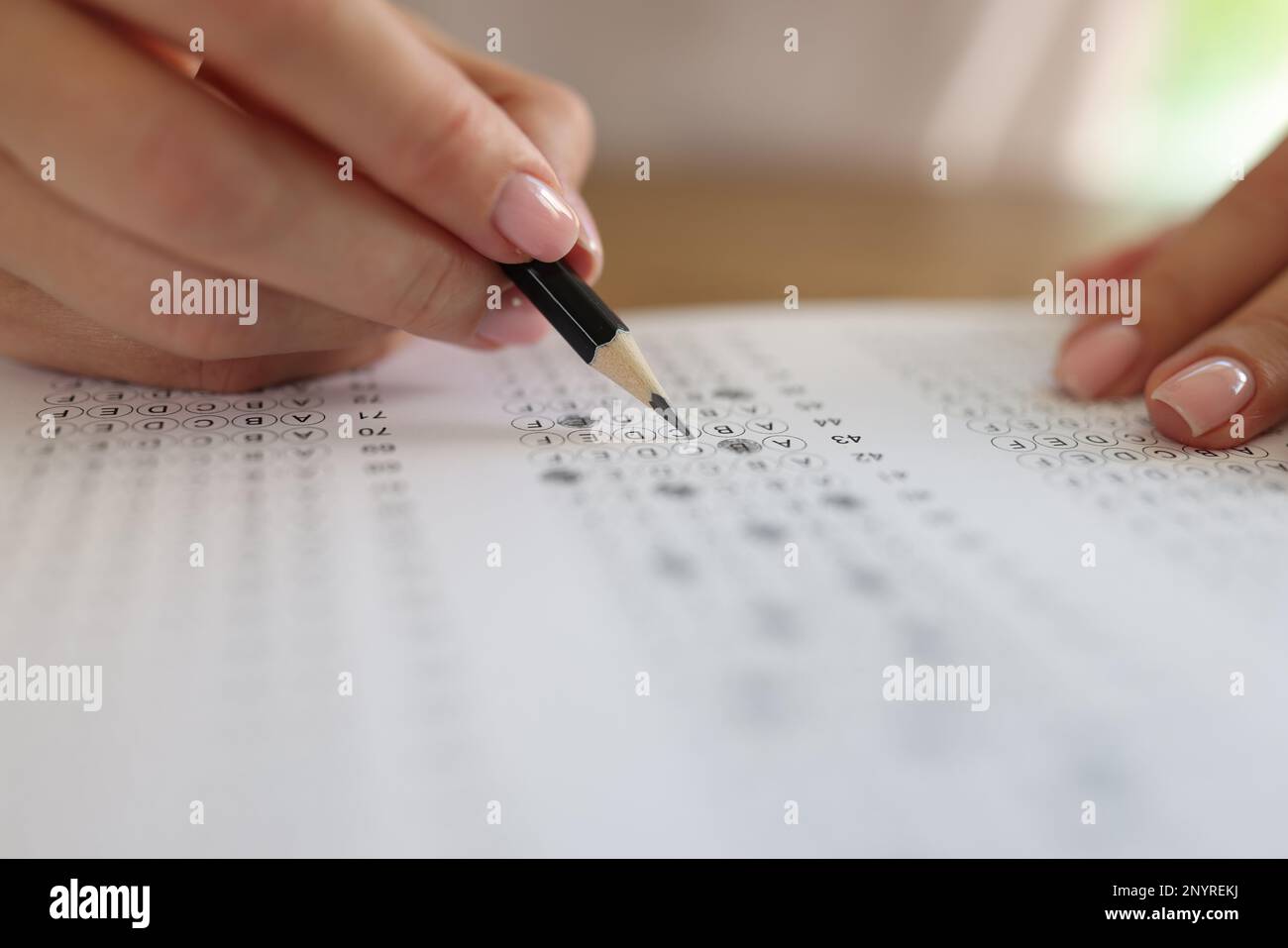 Solving the test exam paper hi-res stock photography and images - Alamy