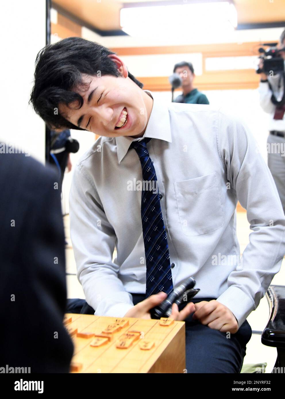 14-year-old professional shogi player Sota Fujii reviews the Ryuo title shogi match against ...