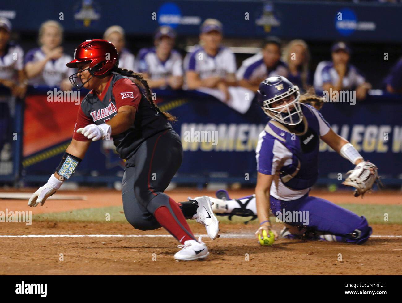 Oklahoma's Fale Aviu avoids the tag of Washington's Morganne Flores on ...