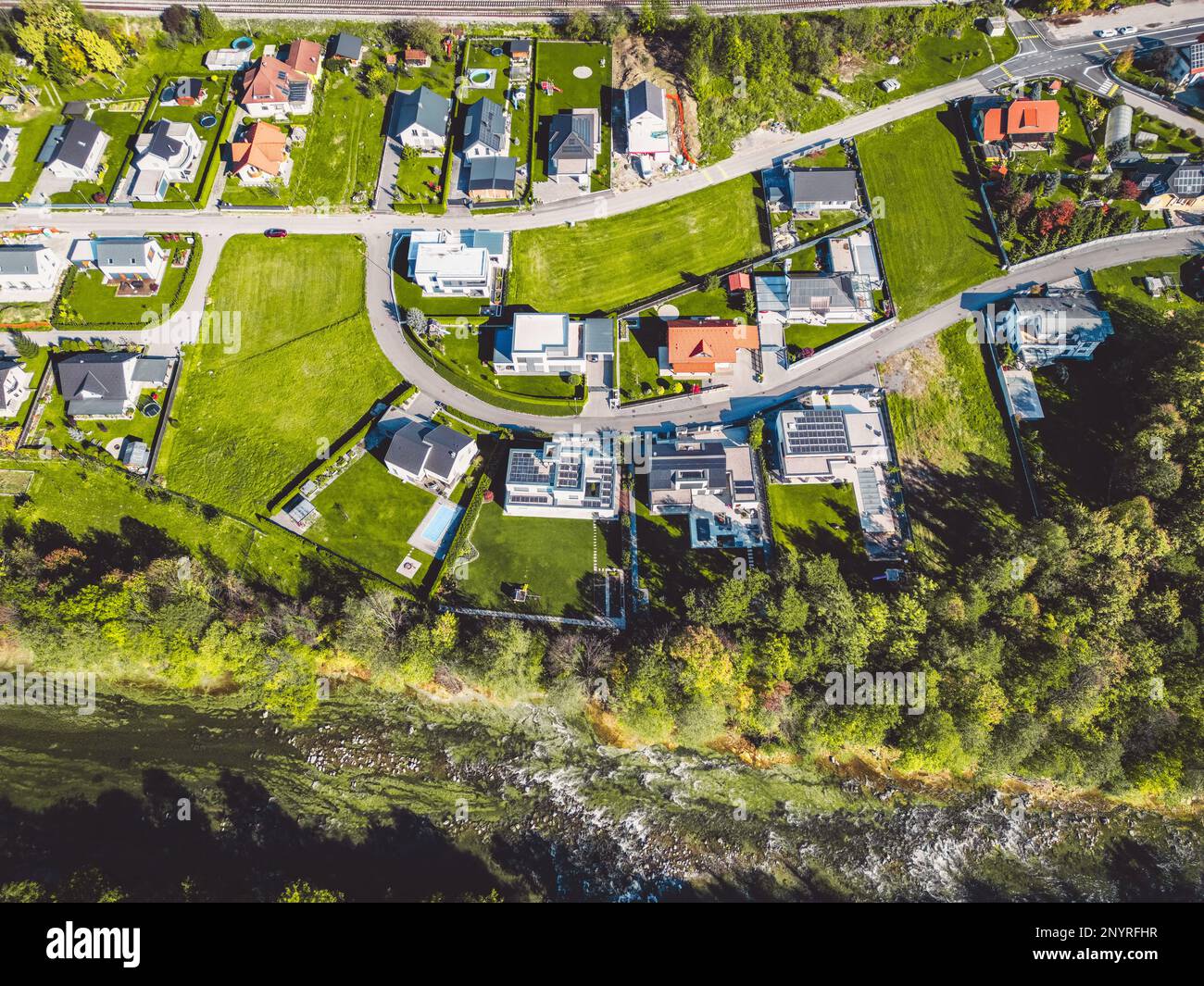 Aerial photo of suburban community, plots of land with modern newly ...