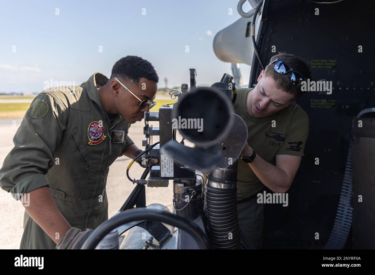 U.S. Marine Corps Sgt. Dane Robison, right, and Lance Cpl. Jonathan ...