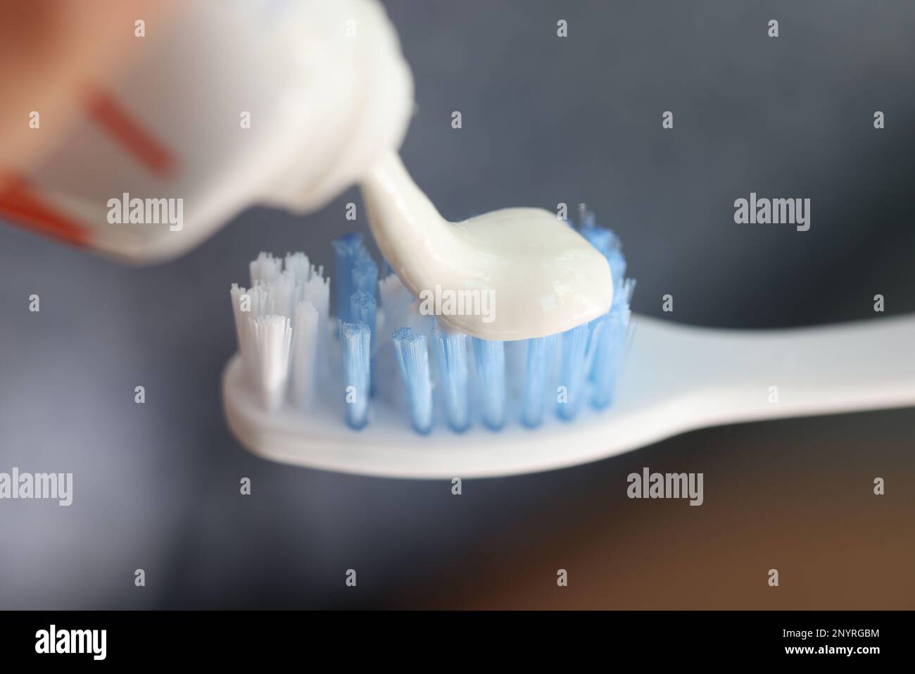 Snow white toothpaste on tooth brush, morning hygiene Stock Photo - Alamy