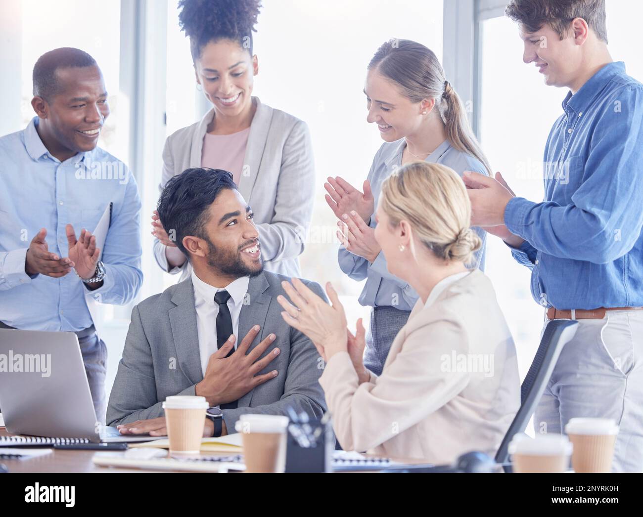 Business, team and man with promotion, applause and happiness for ...