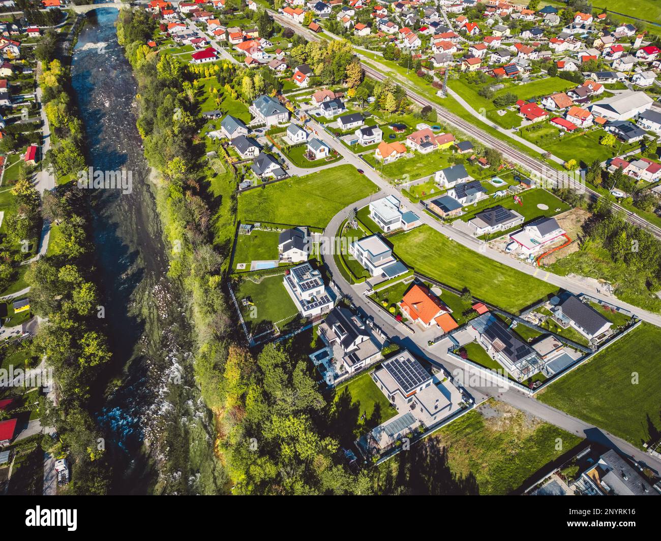 Aerial photo of suburban community with river running trough Stock ...