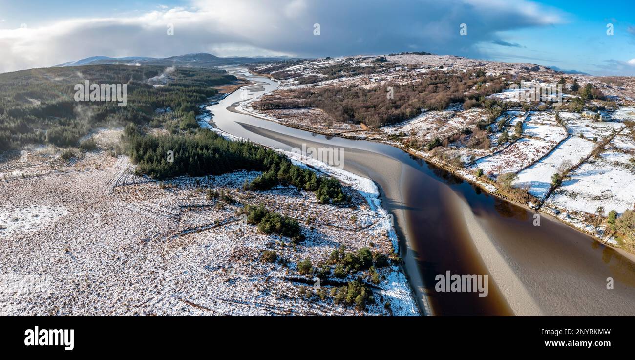 Aerial view of snow covered Gweebarra River between Doochary and ...