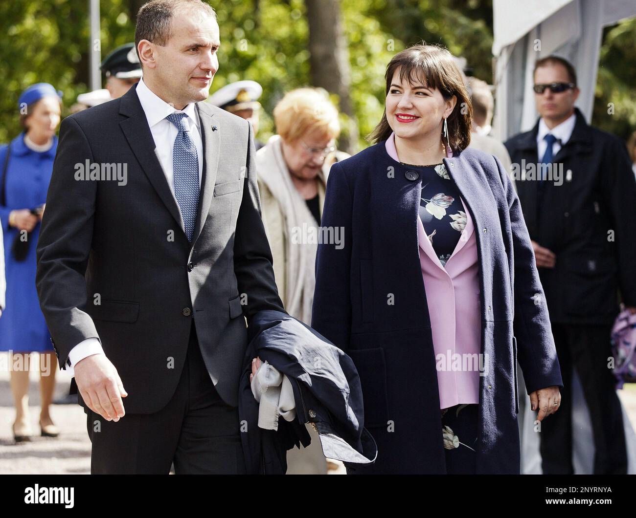 Iceland's President Gudni Thorlacius Johannesson, left, walks with his ...