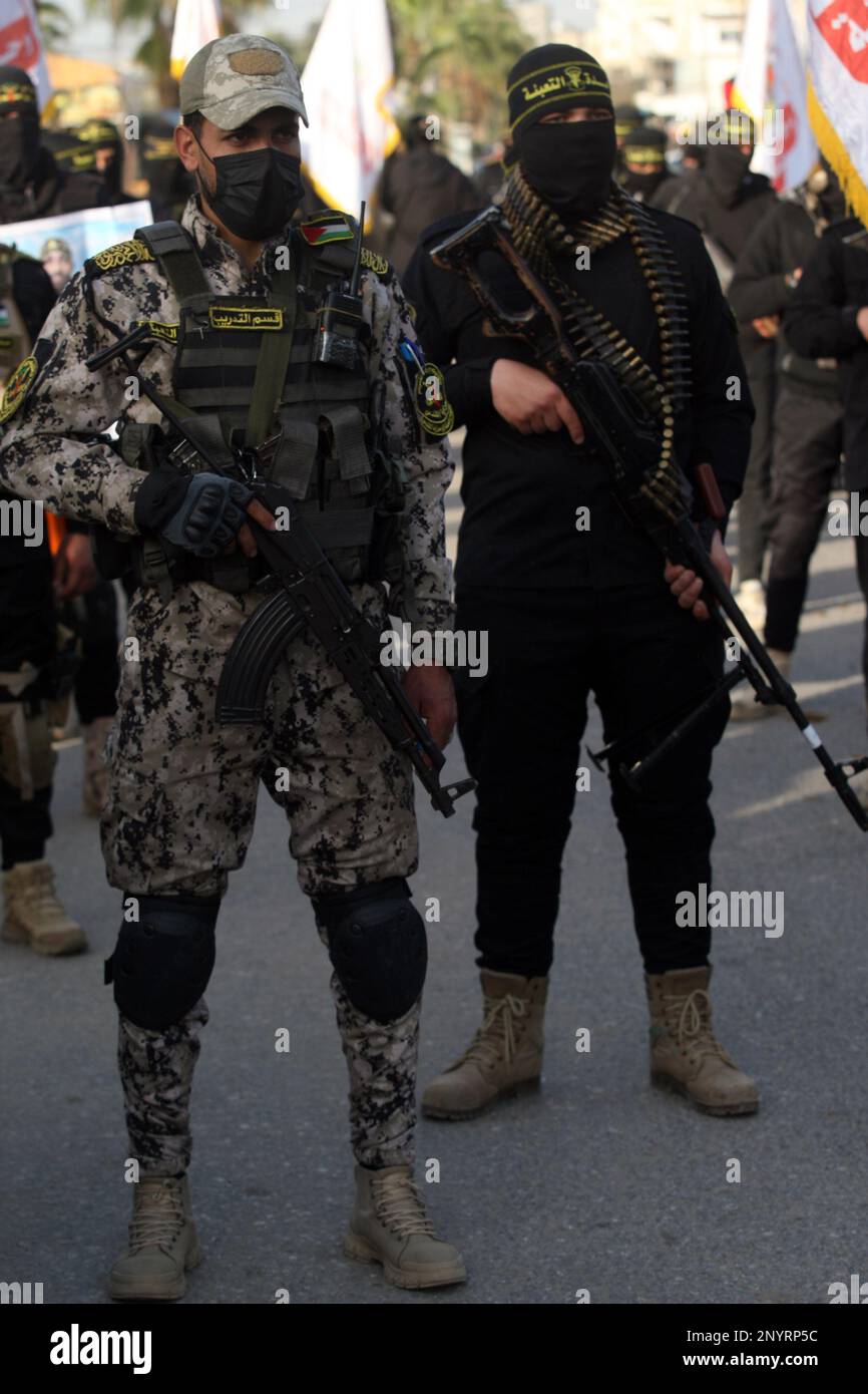 Masked Palestinian fighters of The Islamic Jihad movement take part in ...