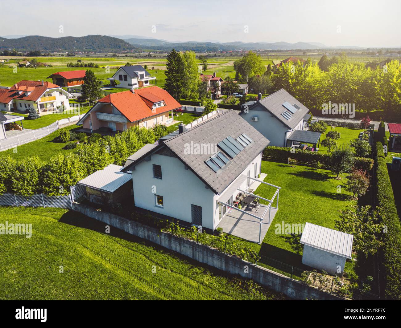 Aerial view of family homes and their backyards somewhere in the ...