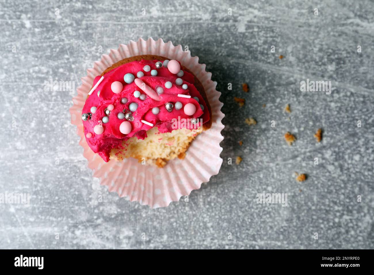 Failed cupcake on light grey table, top view. Troubles happen Stock ...