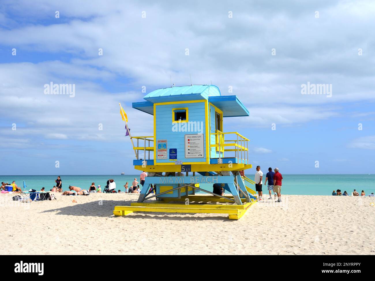 Lifeguard tower with yellow flag at South Pointe on winter sunny day ...