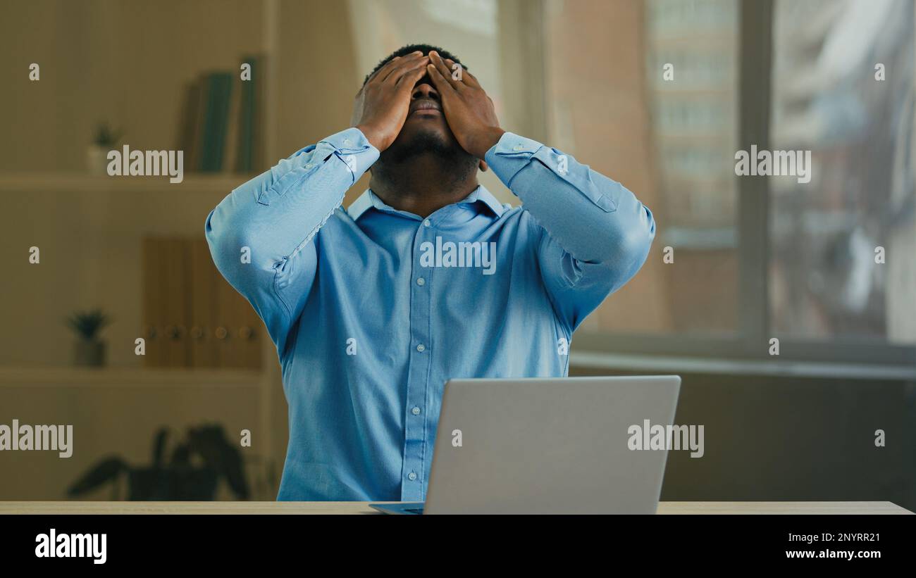 Desperate sad angry African American businessman manager entrepreneur ...