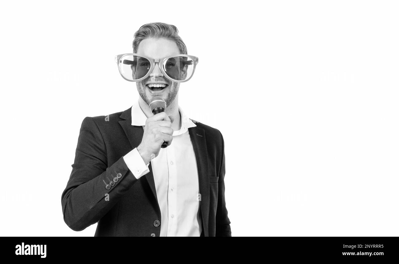 Experience karaoke like never before. Karaoke singer. Happy businessman ...