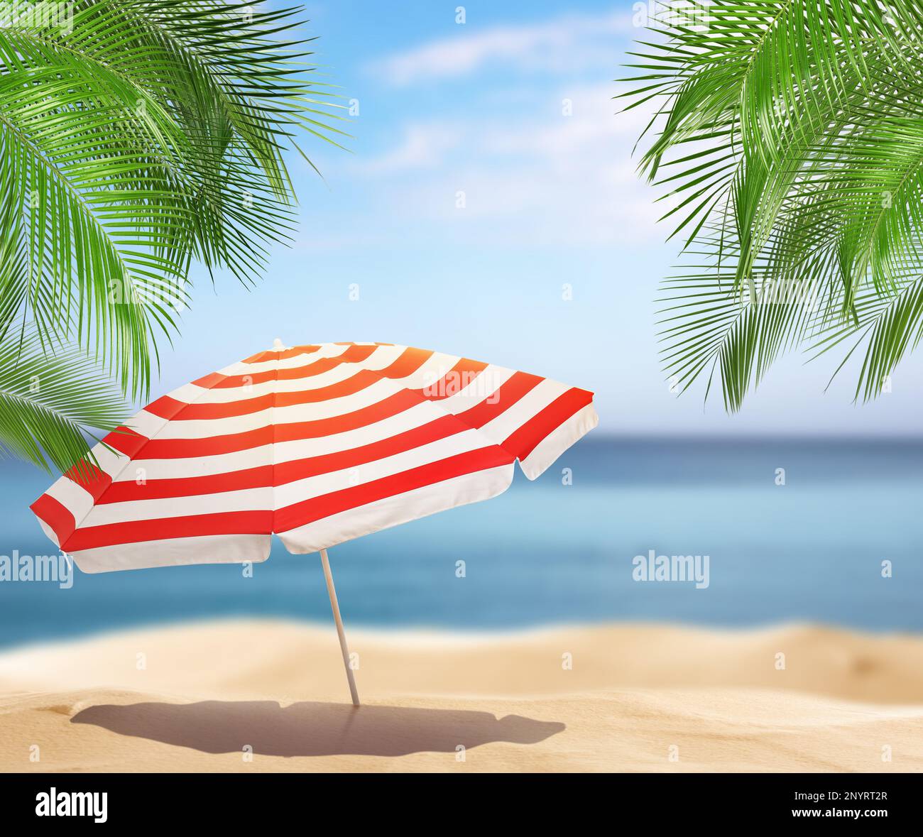 Open big beach umbrella on sandy coast Stock Photo - Alamy