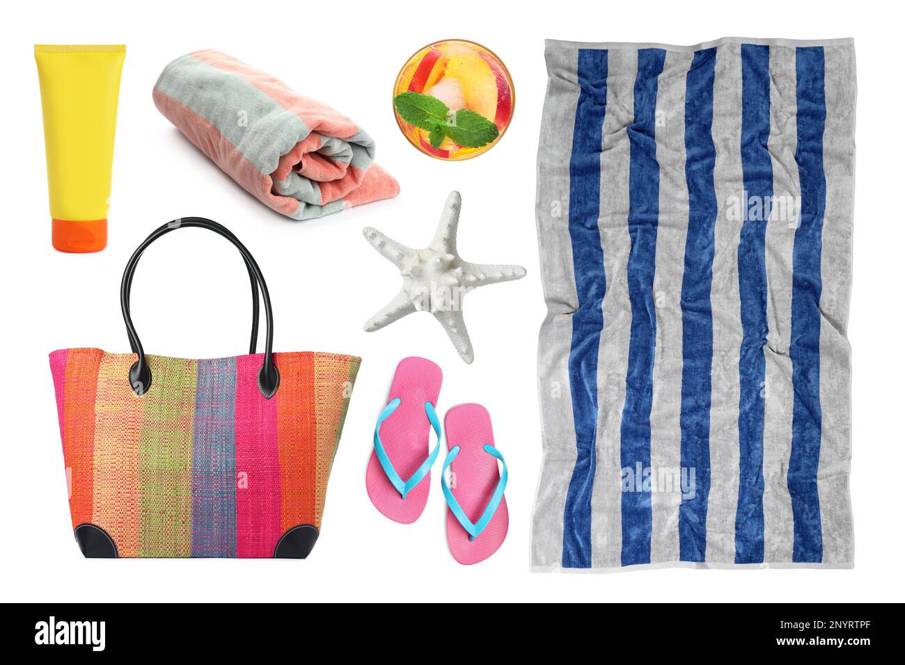 Set with towel and other beach accessories on white background Stock ...