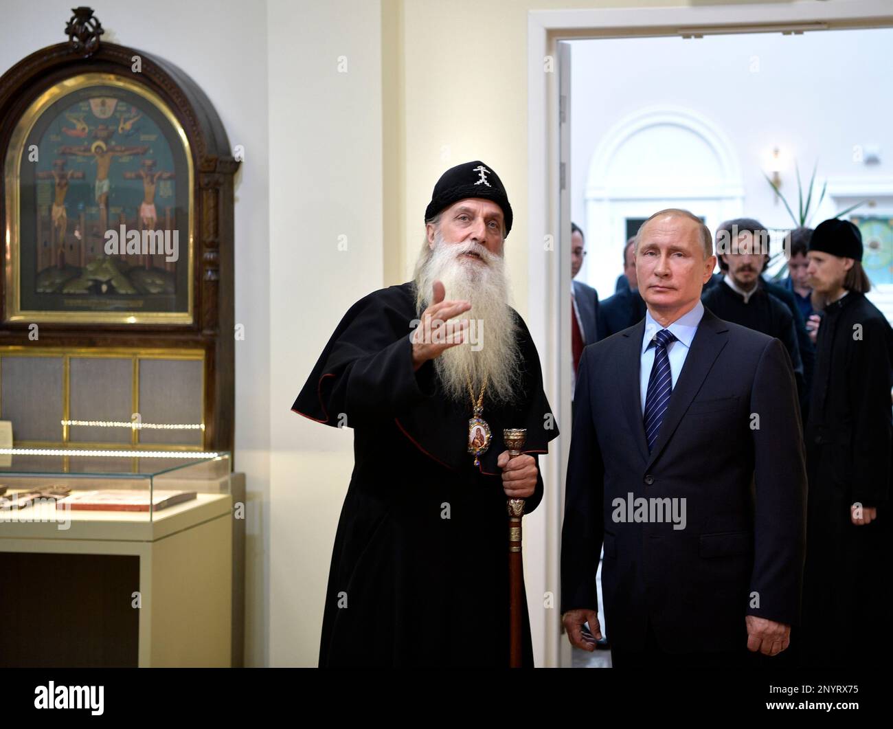 Russian President Vladimir Putin is accompanied by Head of the Russian ...