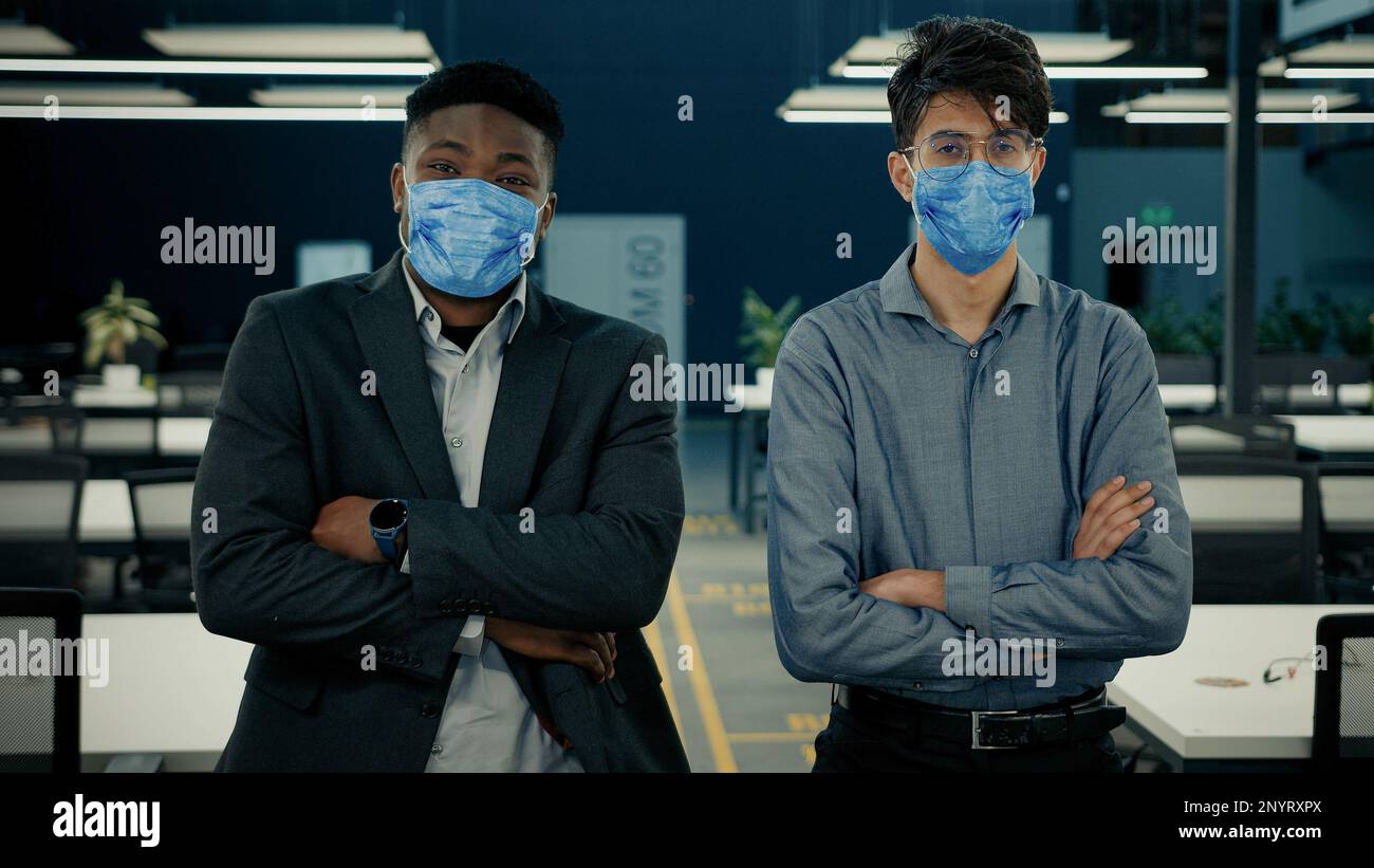 Business people two confident colleagues office workers african indian ...