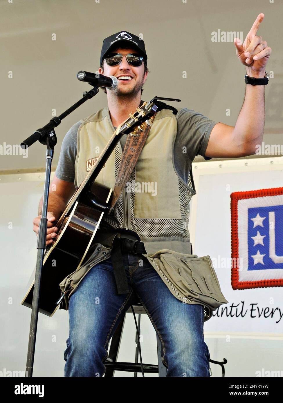 Luke Bryan performs during the ACM / USO Concert Event on Nellis Air ...