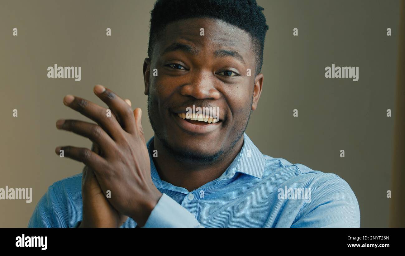 African american happy emotional man winner office worker male ...