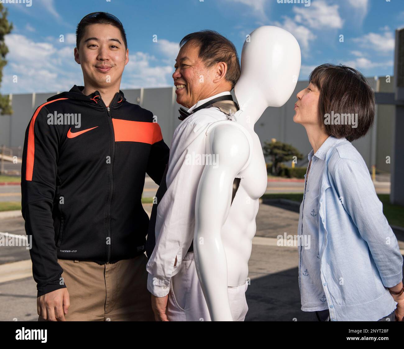 The Chiao family have fun with the mannequin costume in Buena Park on Wednesday, May 24, 2017 ...