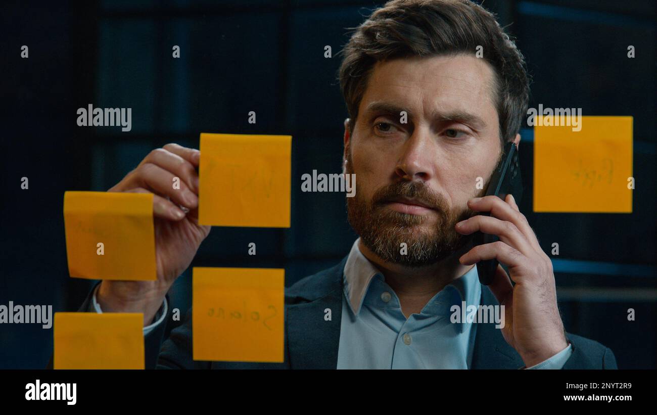 Caucasian businessman marketing manager middle-aged 40s man talk mobile ...