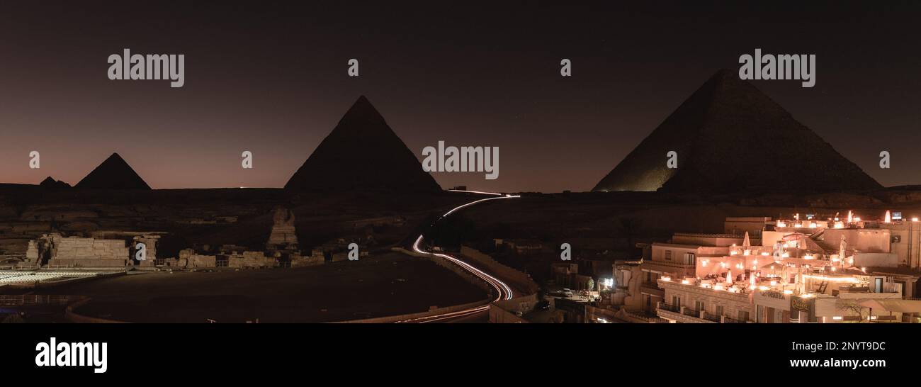 Panorama View of The Great Pyramids of Giza at Night Stock Photo - Alamy