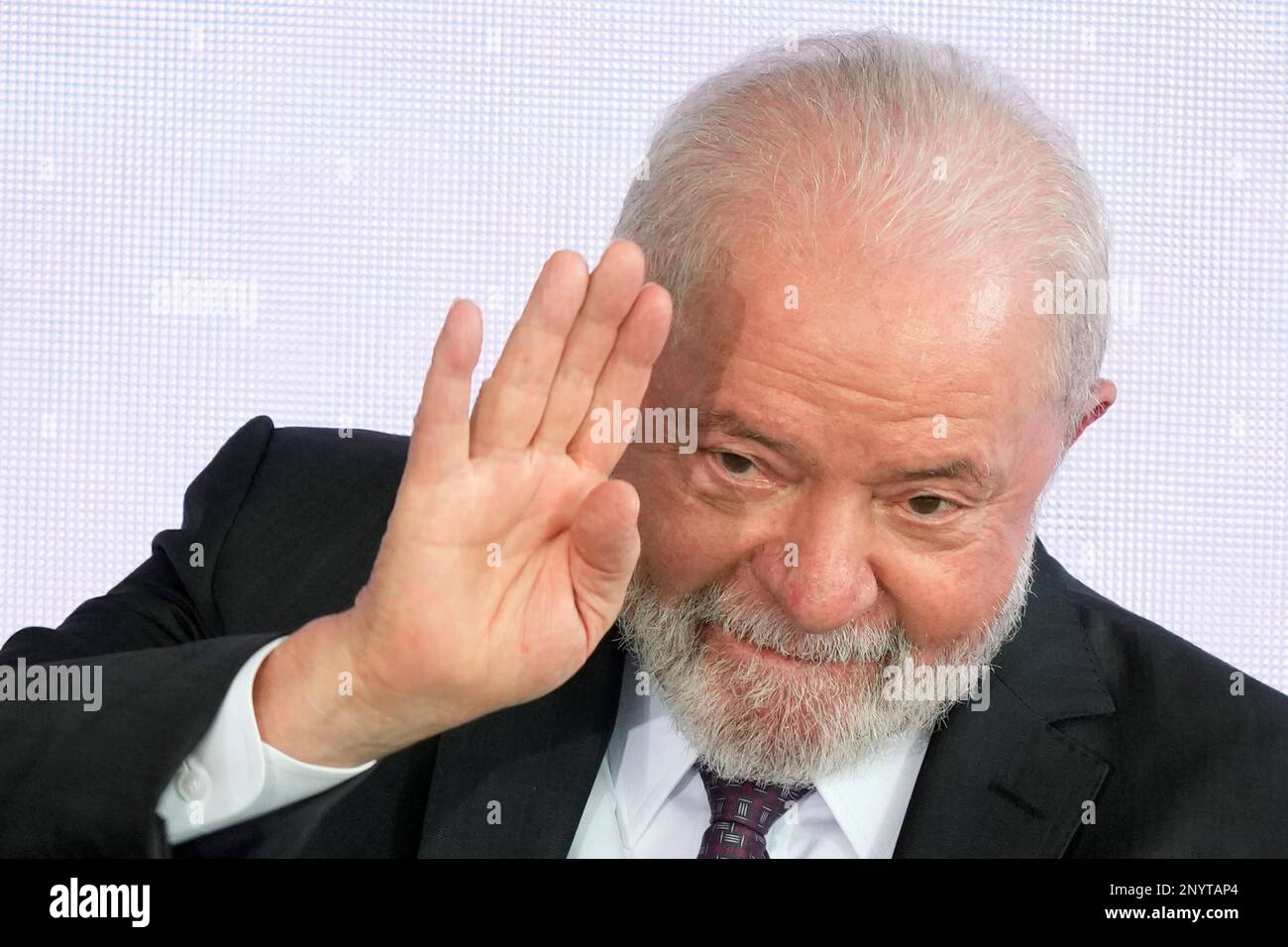Brazil's President Luiz Inacio Lula da Silva waves during a ceremony ...