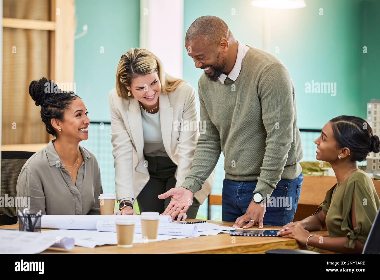 Teamwork, planning and blueprint with people in meeting for ...