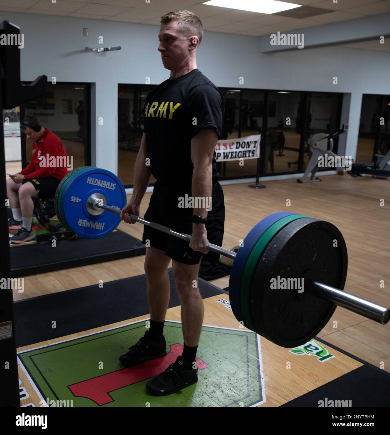 A Soldier assigned to the 1st Infantry Division performs a 315-pound ...