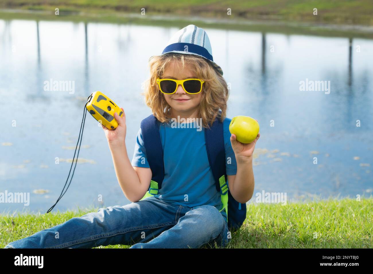 Child with backpack, traveller or explorer. Concept of exploration and ...