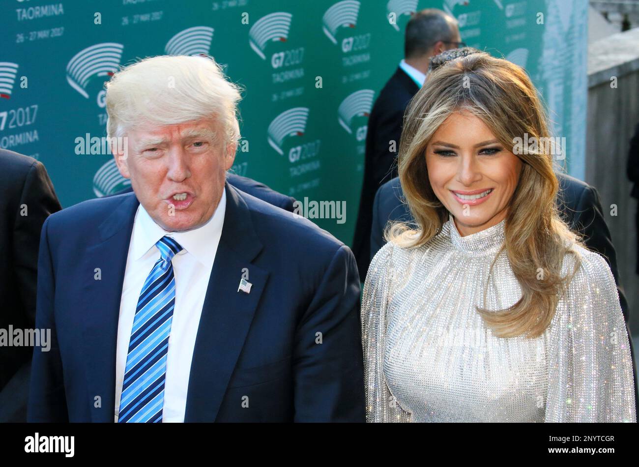 U.S. President Donald Trump (L) and his wife Melania attend a concert ...