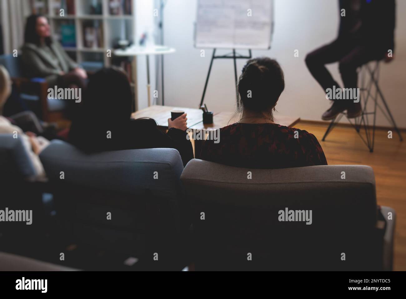 Female participants audience at the symposyum meeting, attendees in a ...