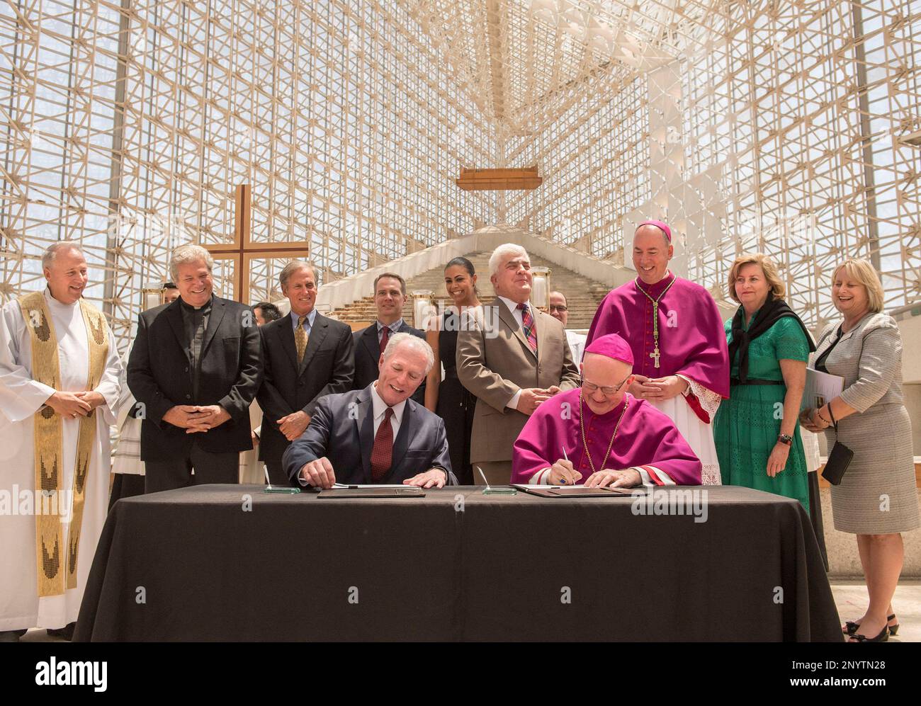 Bishop Kevin Vann, left, and John Rochford, right, president and COO of ...