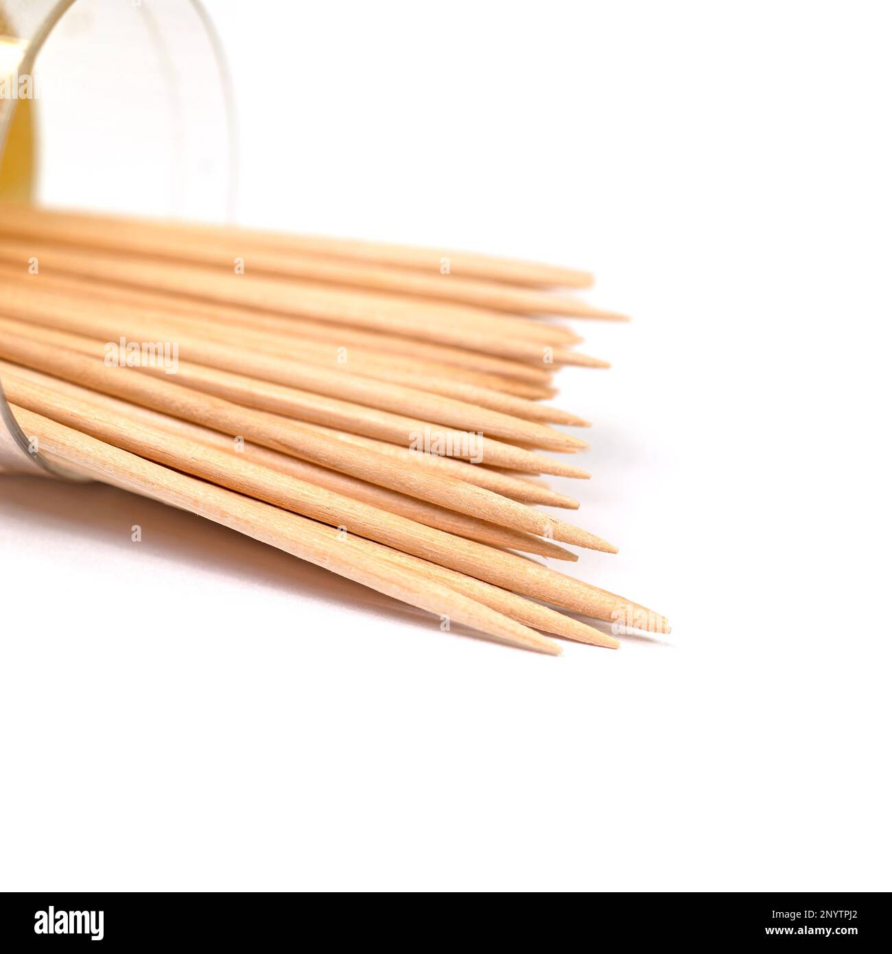 Wooden toothpick against white background Stock Photo - Alamy