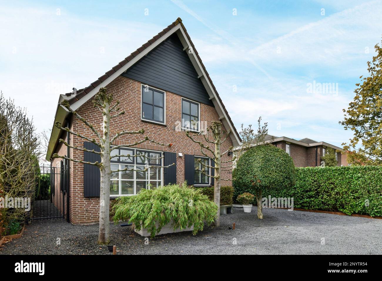 Amsterdam, Netherlands - 10 April, 2021: a house in the middle of some ...