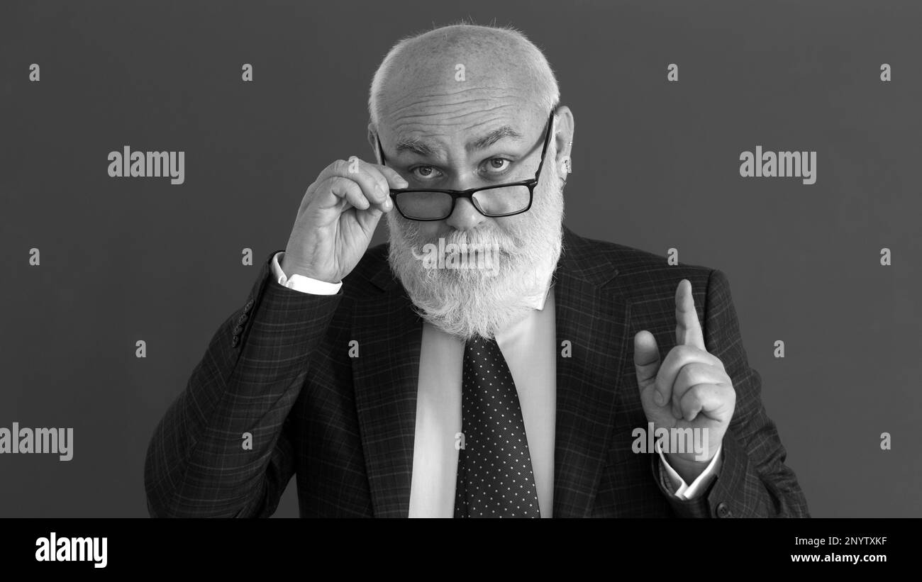 Academic success. Mature elegant professor with glasses. School ...