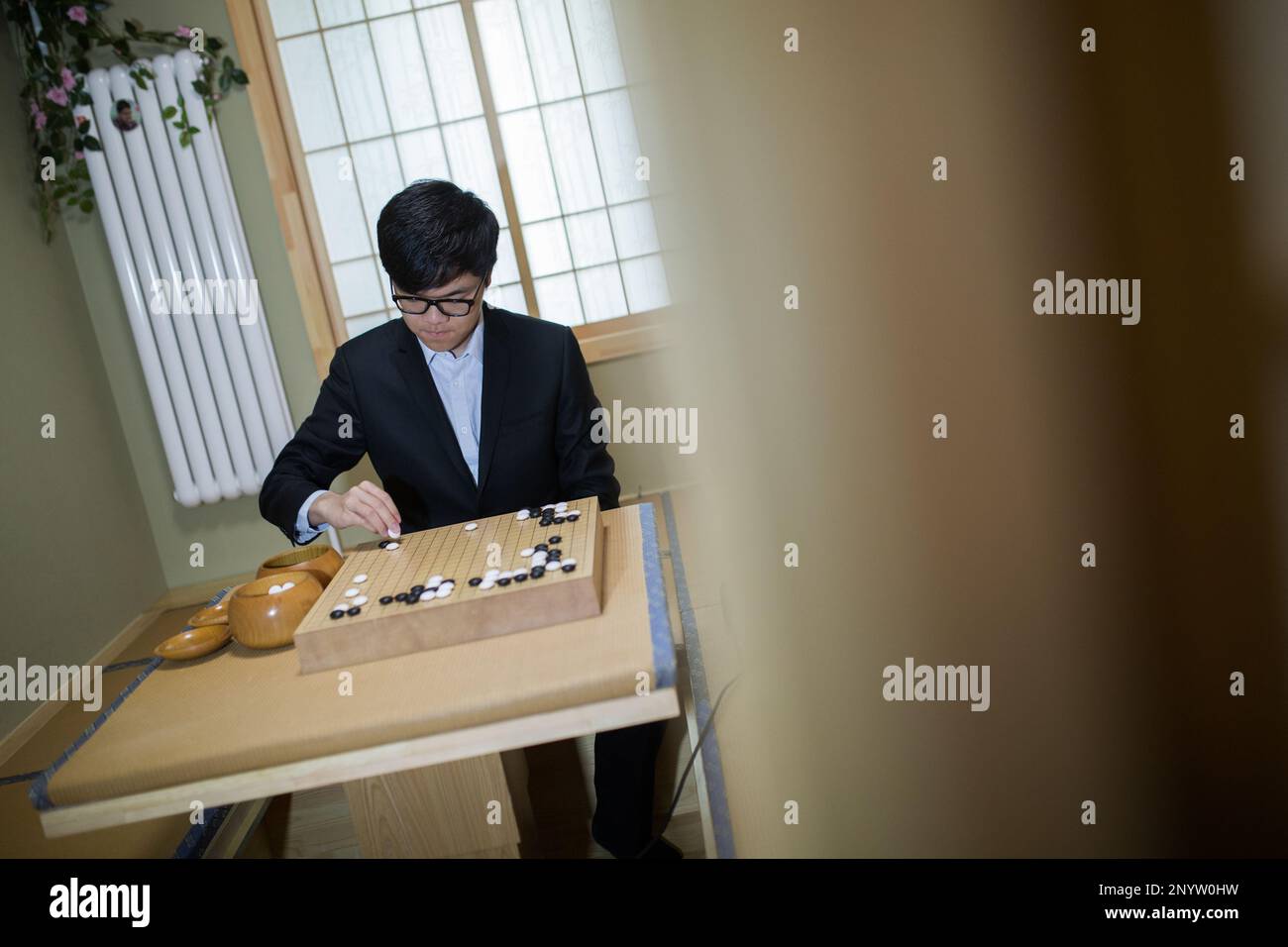 --FILE--Chinese Go player Ke Jie poses during an interview in Beijing ...