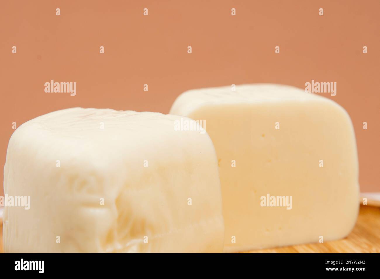 Minas half-cured cheese on a bamboo tray Stock Photo - Alamy