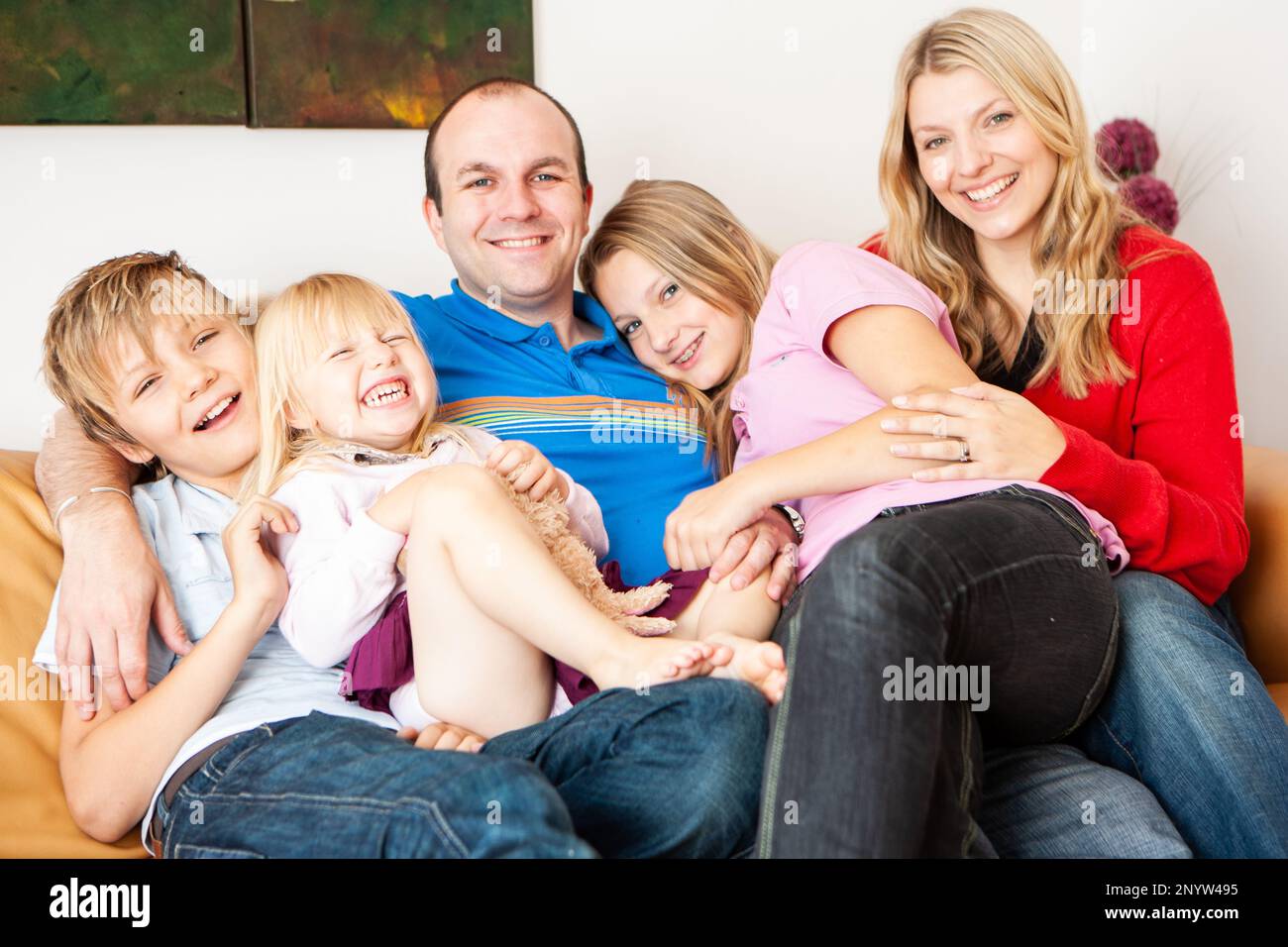 Family Life, The Best Dad. A family gather around father in an ...
