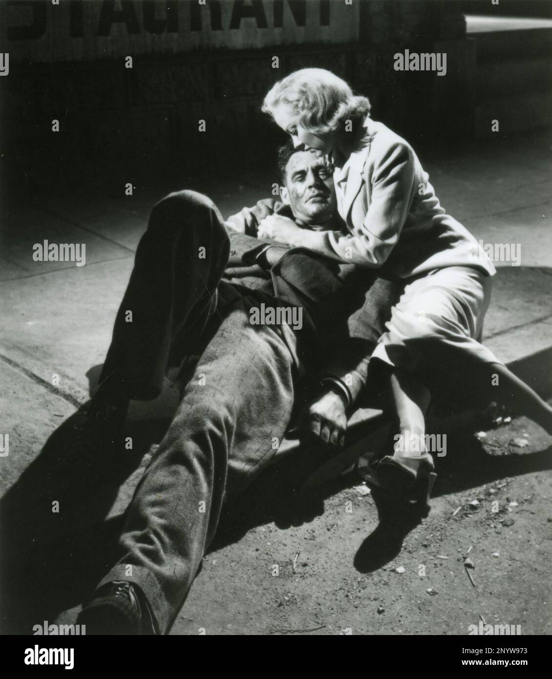 American actor Robert Ryan and actress Audrey Totter in the movie The ...