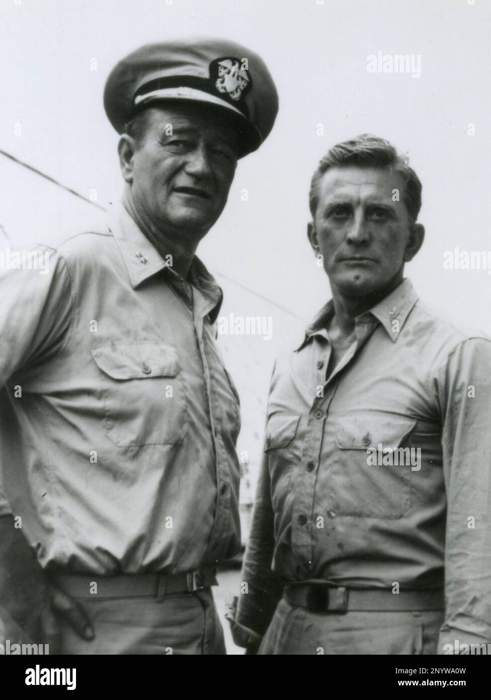 American actors John Wayne and Kirk Douglas in the movie In Harm's Way ...