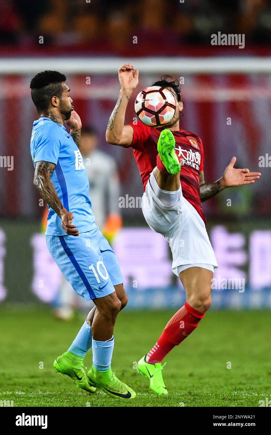 Brazilian football player Alex Teixeira, left, of Jiangsu Suning ...