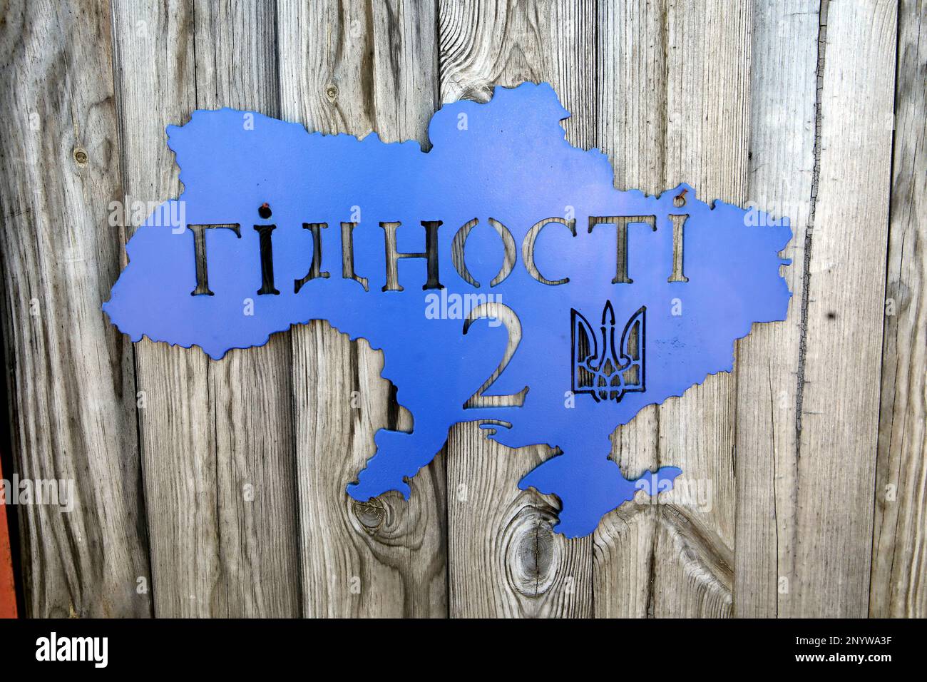 ZAHALTSI, UKRAINE - MARCH 2, 2023 - A homemade address plaque featuring ...