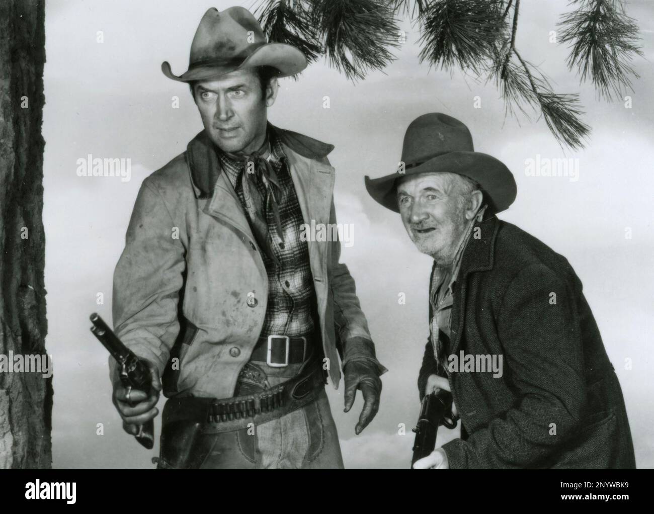 American actors James Stewart and Walter Brennan in the movie The Far ...