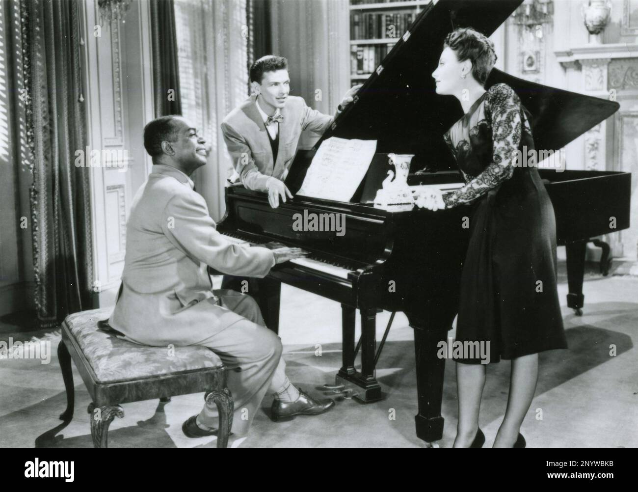 American actors Dooley Wilson, Frank Sinatra and Michele Morgan in the ...
