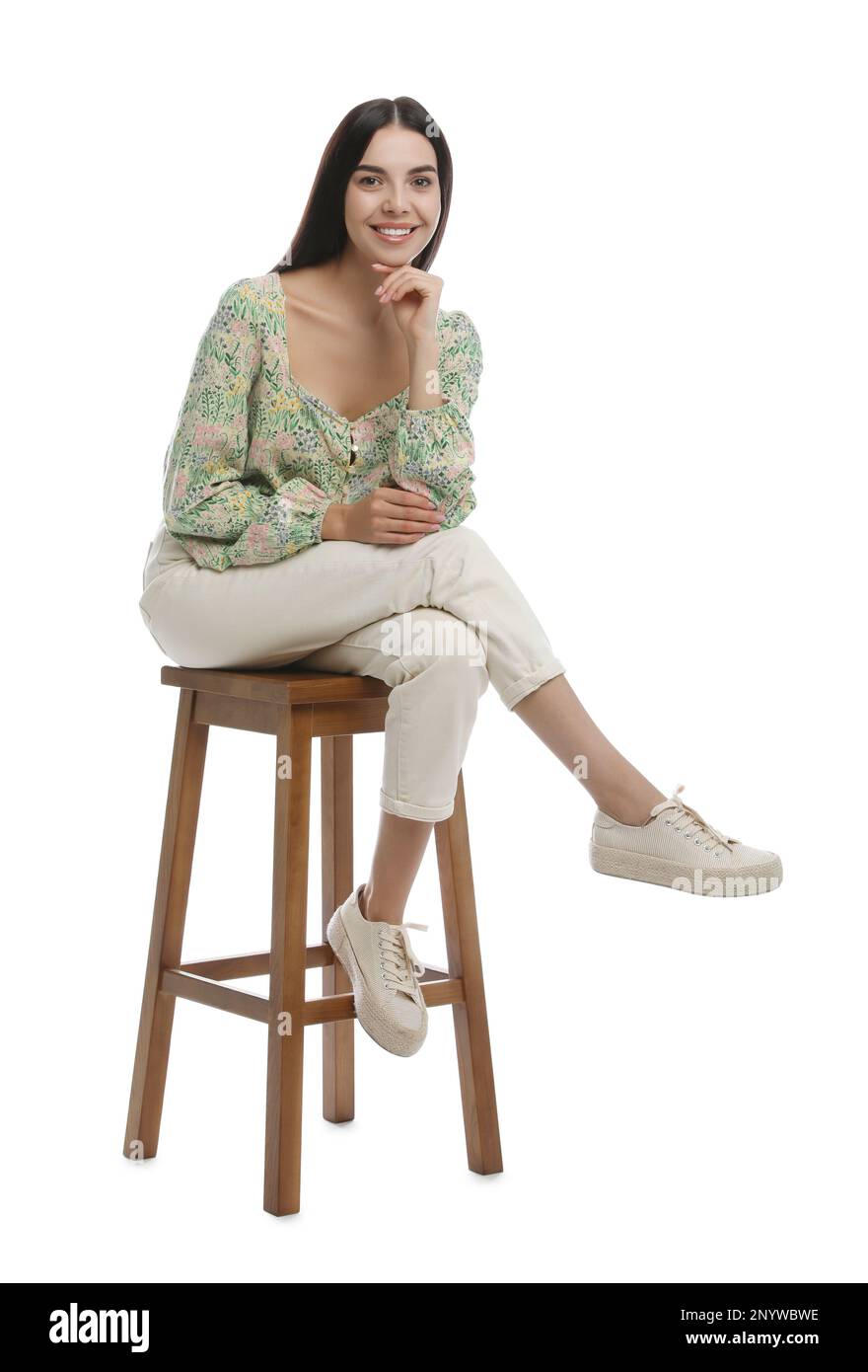 Woman sitting on bar stool Cut Out Stock Images & Pictures - Alamy