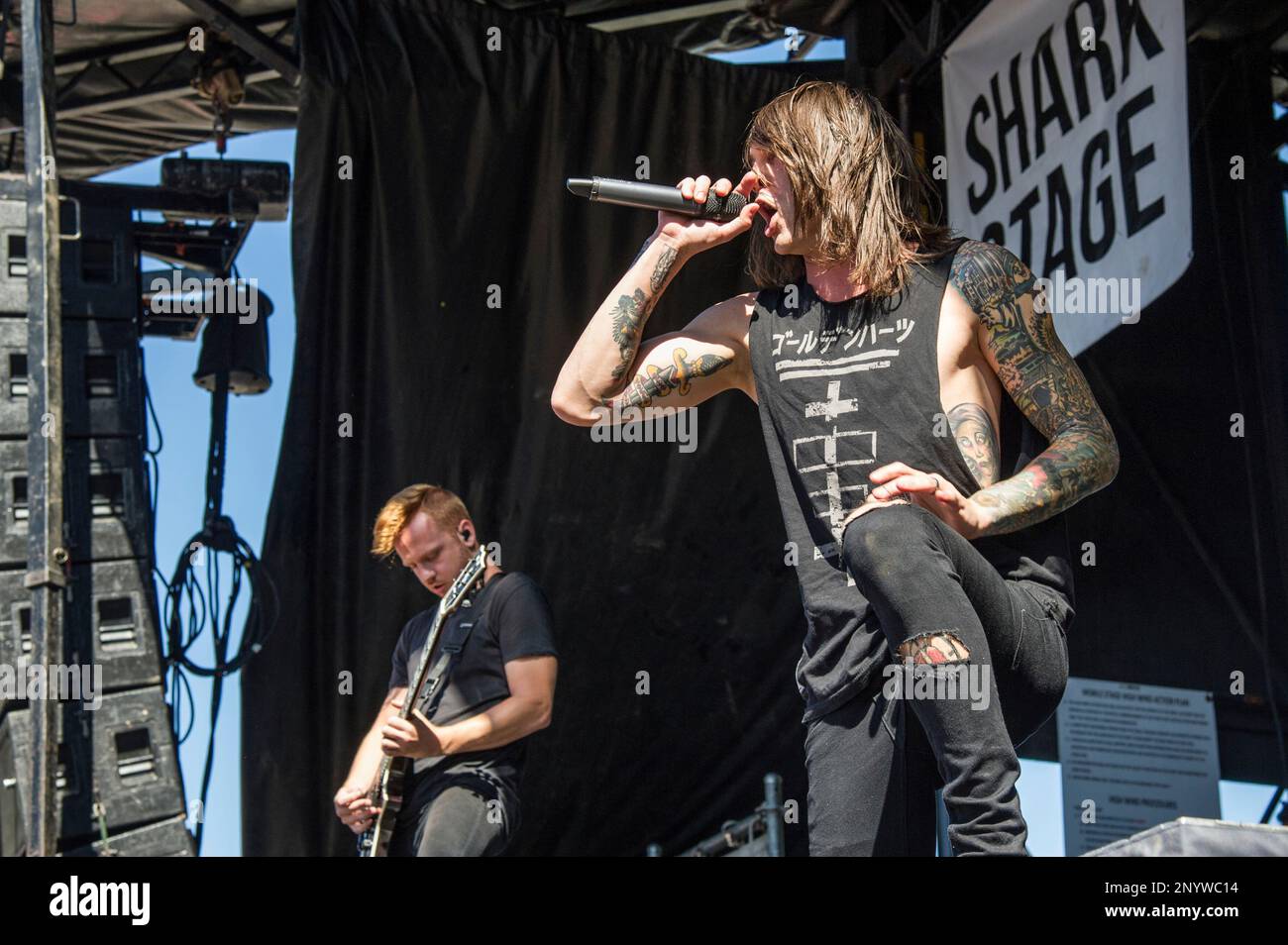 Beau Bokan of Blessthefall performs during the 2015 Vans Warped Tour at ...