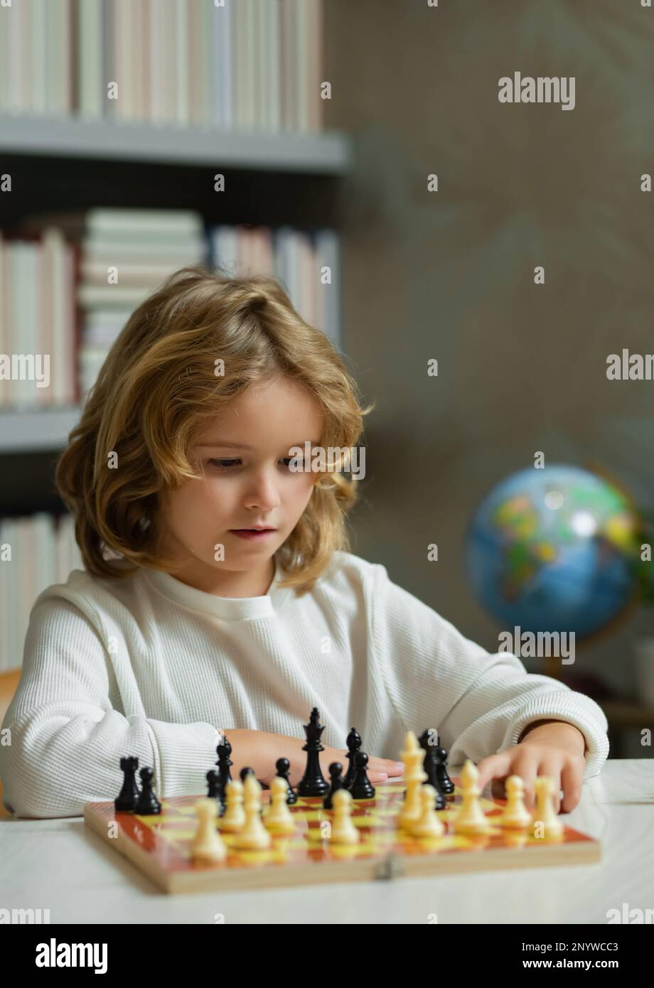 Little kid chessman play chess game, checkmate Stock Photo - Alamy