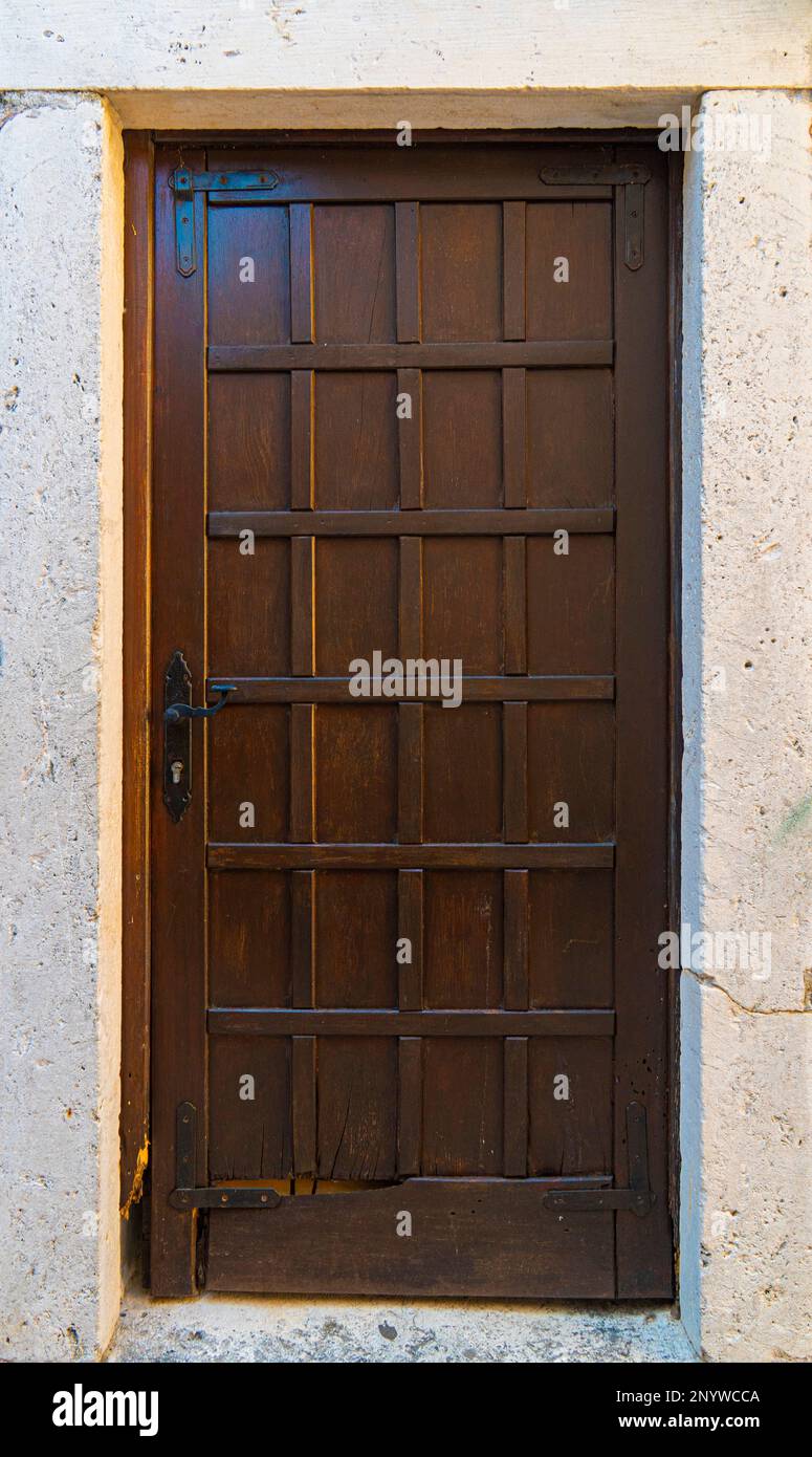 Building's facade. Wall of an old house. Closed door. Architectural ...